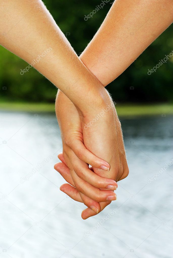 Hand in a hand Stock Photo by ©Pakhnyushchyy 2786756