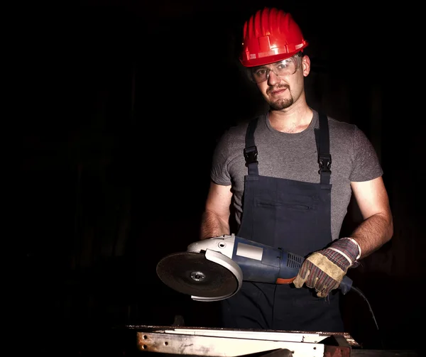 Manual worker with grinder - Stock Image - Everypixel
