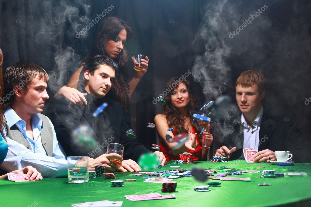 Young woman throwing chips on the table while playing cards — Stock ...