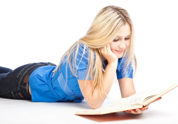 Girl on the floor is reading book — Stock Photo © natulrich #2236777