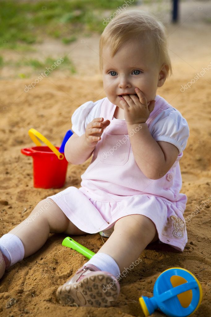 Little girl in sandbox Stock Photo by ©natulrich 4021398
