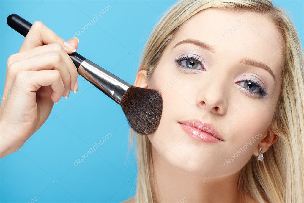 Blonde girl making up — Stock Photo © zastavkin #2775778