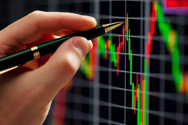 Hand and pen pointer, chart — Stock Photo © Irochka #1333797