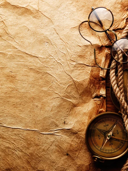 Compass, rope and glasses — Stock Photo © Irochka #5119543