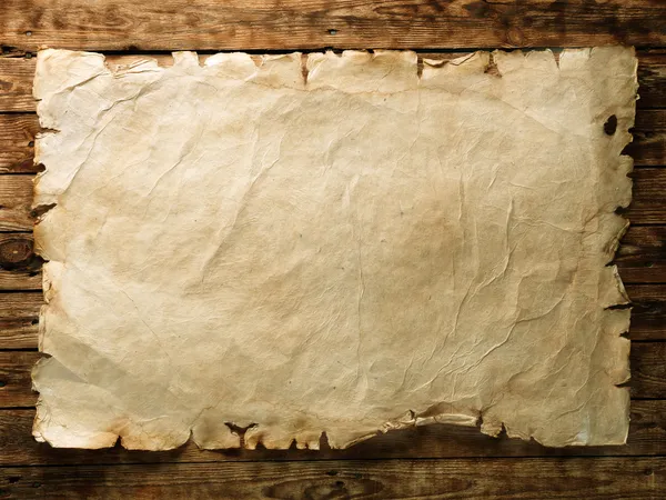 Old paper on wood board ⬇ Stock Photo, Image by © Irochka #5130497