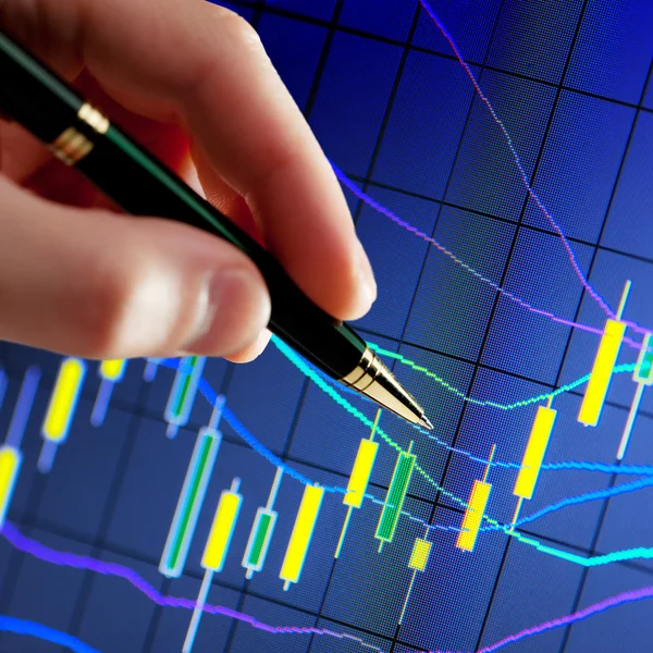 Hand and pen pointer, chart — Stock Photo © Irochka #1333797