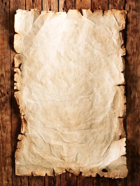 Old paper on wood board ⬇ Stock Photo, Image by © Irochka #5130497