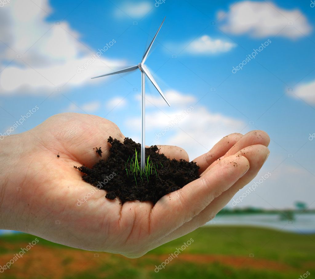 Hand holding windmill Stock Photo by ©Markhegedus 2826223