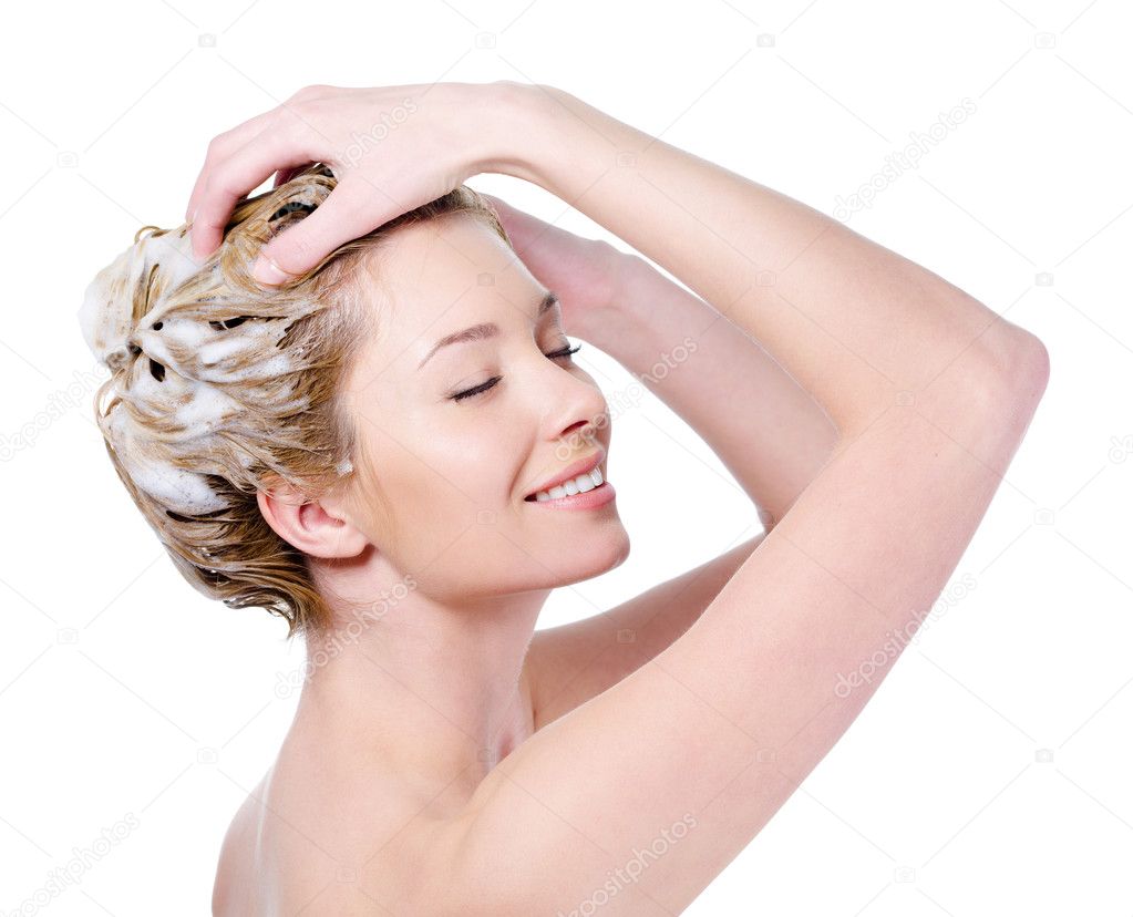 Smiling woman soaping her hair — Stock Photo © valuavitaly #3665051