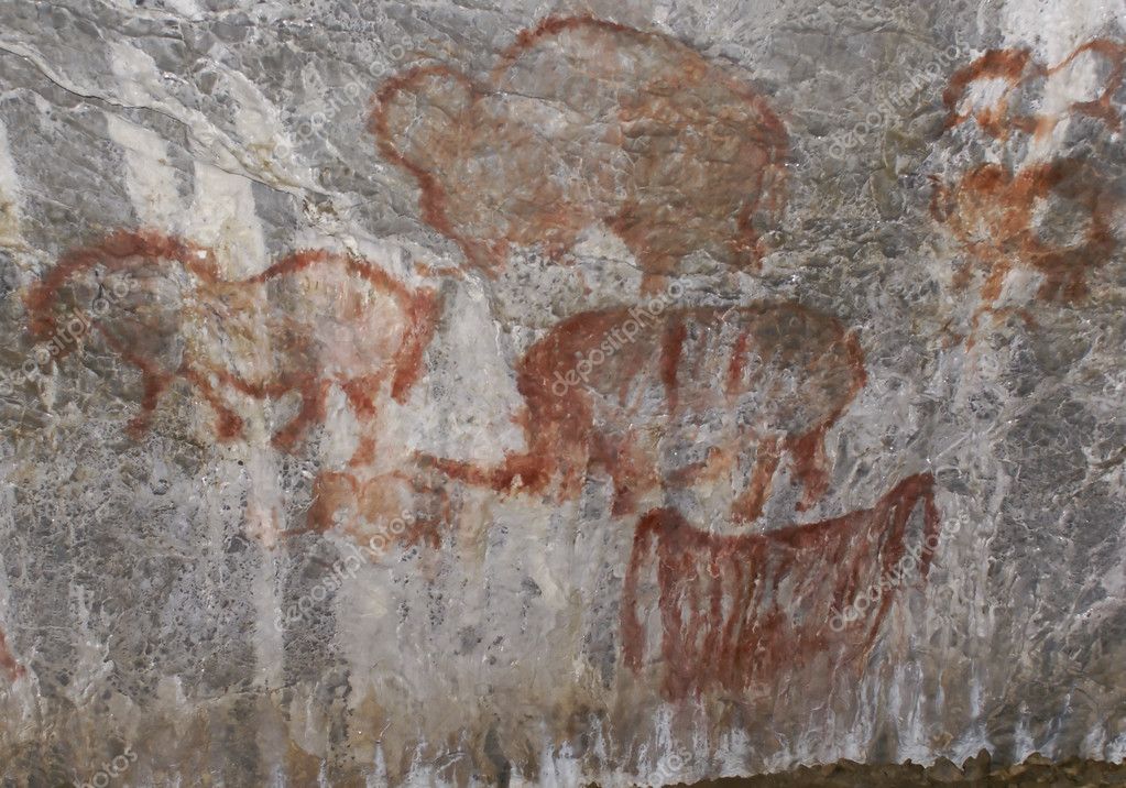 Rock paintings of ancient in a cave — Stock Photo © SplitPine #3136940