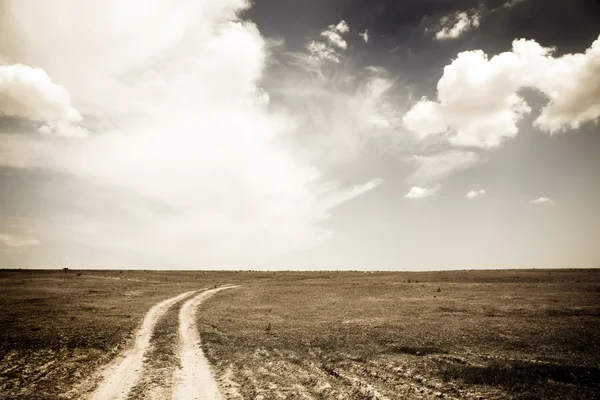 Photo of old road at field in retro style - Stock Image - Everypixel