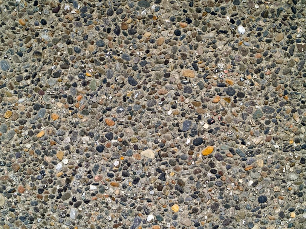 Concrete wall made of small river rocks — Stock Photo © Frankljunior ...