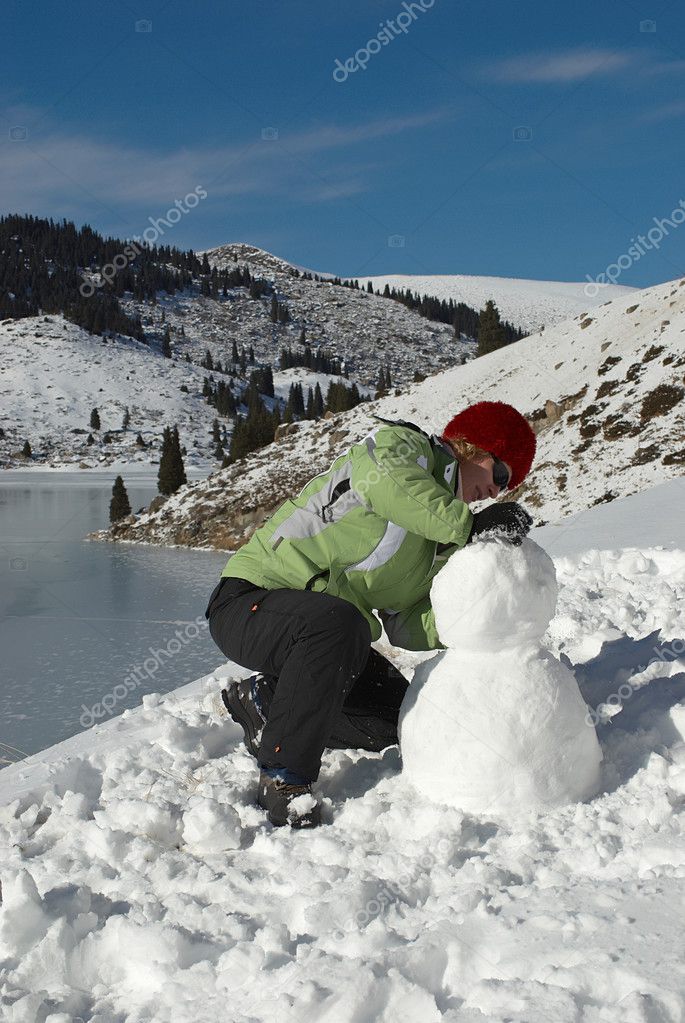 To a build snowman Stock Photo by ©Petrichuk 2695695