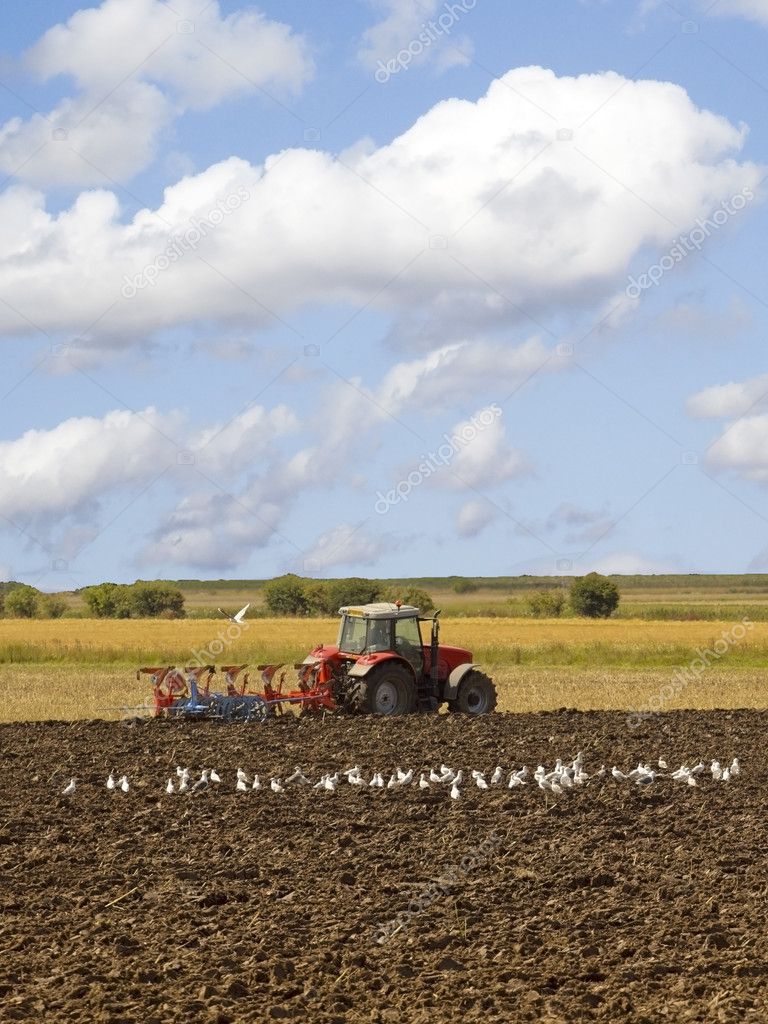 Tractor plowing — Stock Photo © emjaysmith #2798041 Tractor plowing — Stock Photo © emjaysmith #2798041