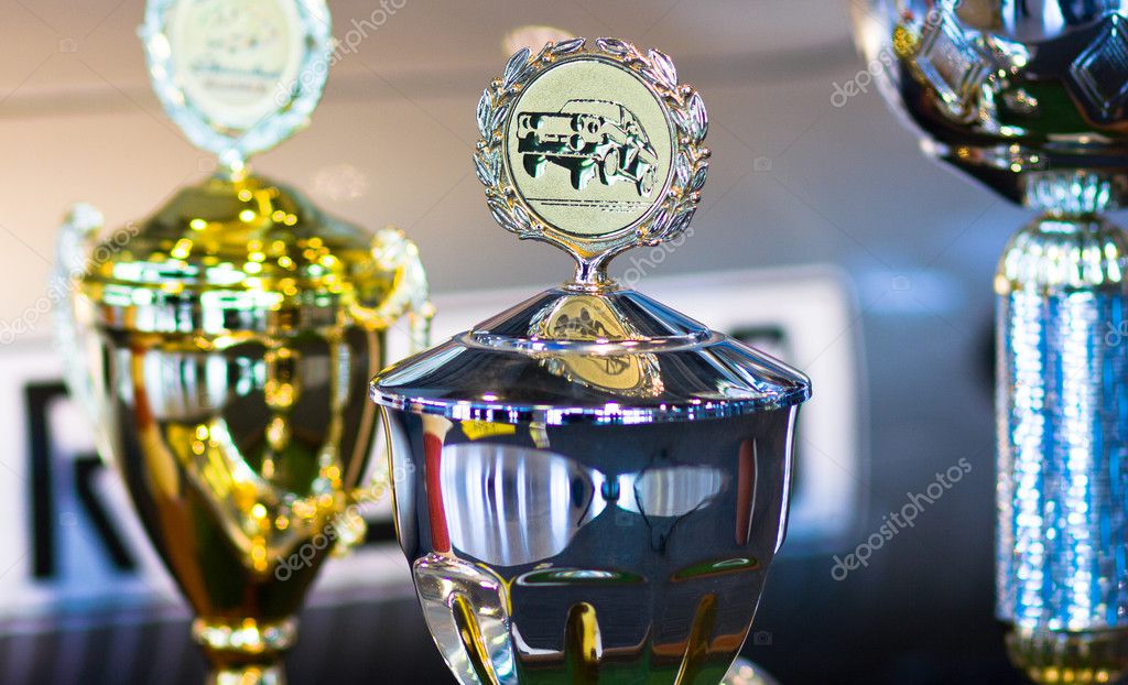 Trophy for car race winning or medal on background with a Automo Stock ...