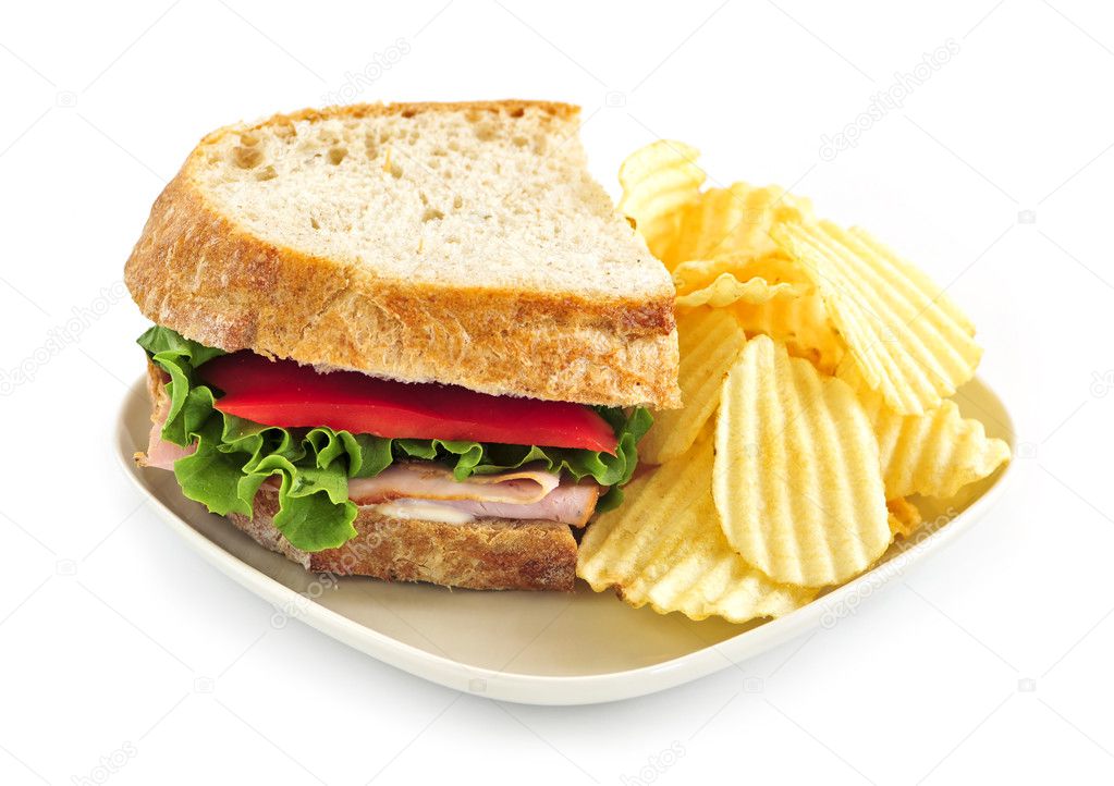 Sandwich and potato chips — Stock Photo © elenathewise #4565244
