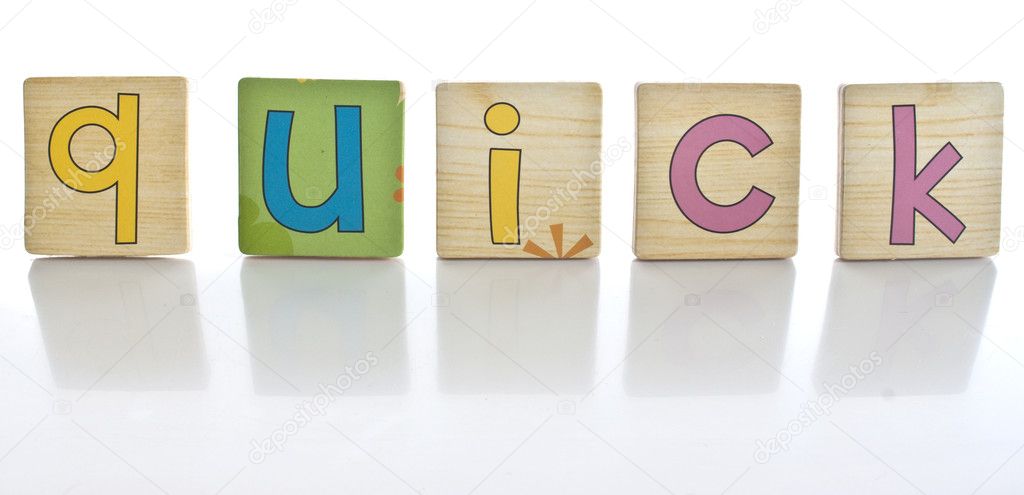 Wooden tiles - spelling QUICK — Stock Photo © theclarkester #3785511