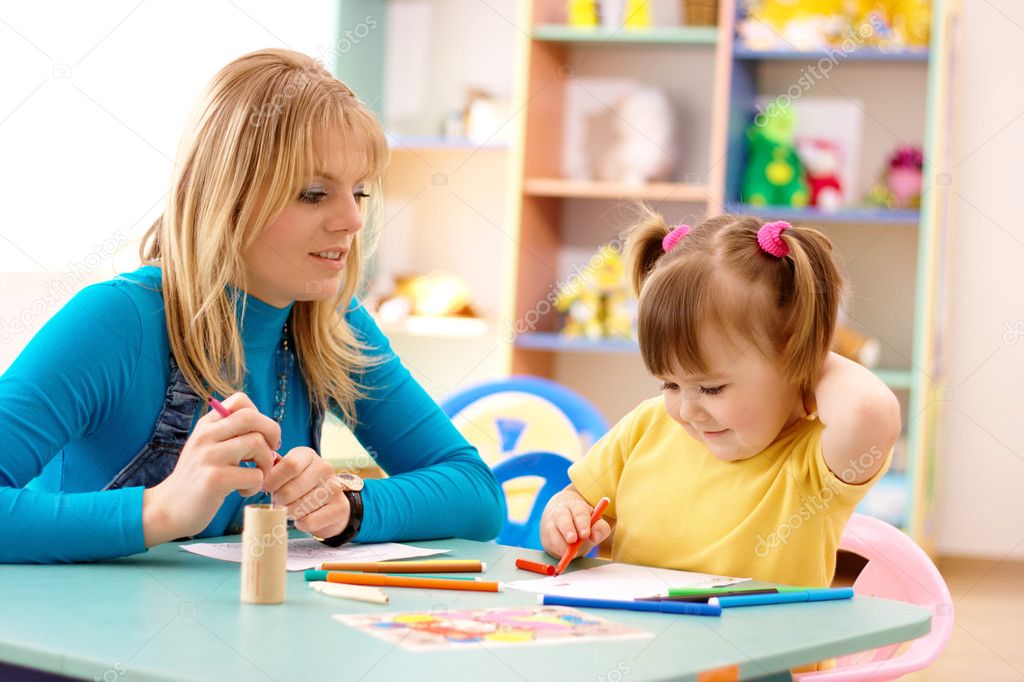 Teacher with child in preschool — Stock Photo © Kobyakov #3179609