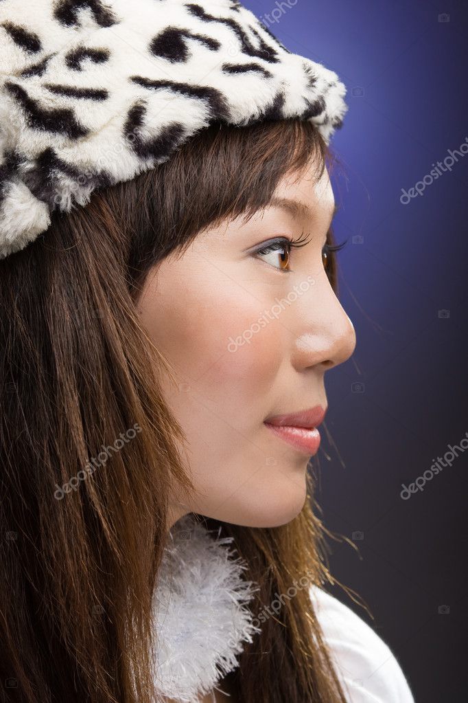 Beautiful asian girl looking right — Stock Photo © stockhouse #3182598