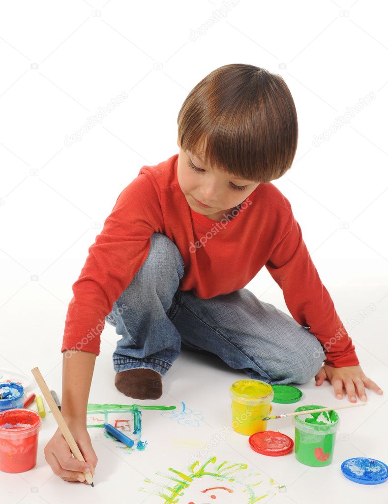 Little boy paints — Stock Photo © Lebval #4299784