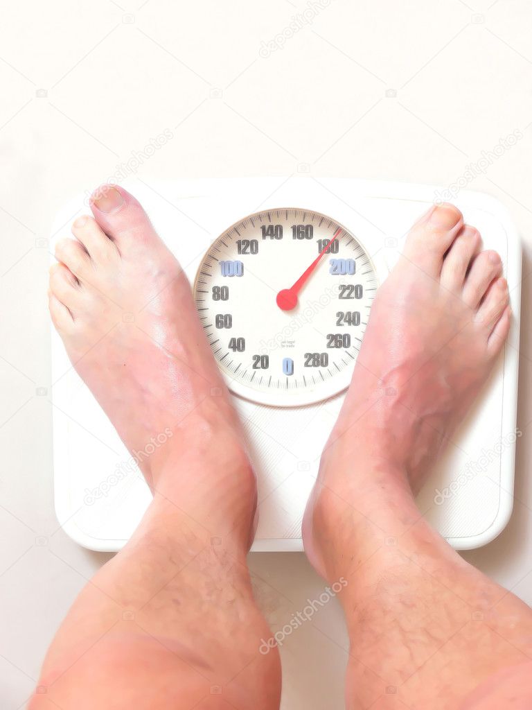 Man on scale — Stock Photo © sucher #3600418