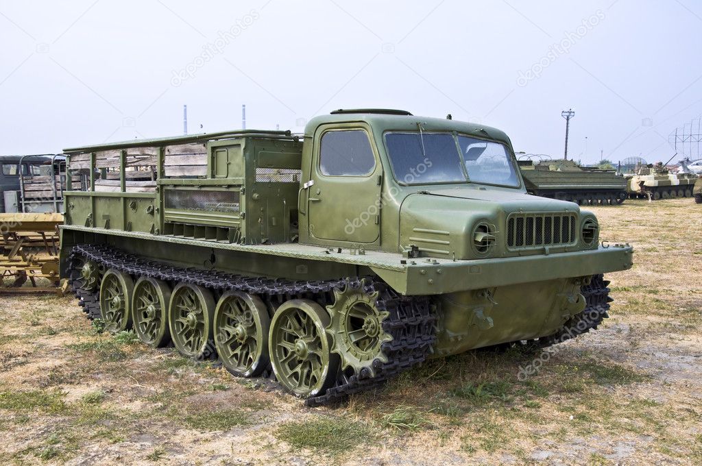 All-terrain vehicle on tracks Stock Photo by ©Oledjio 3717888