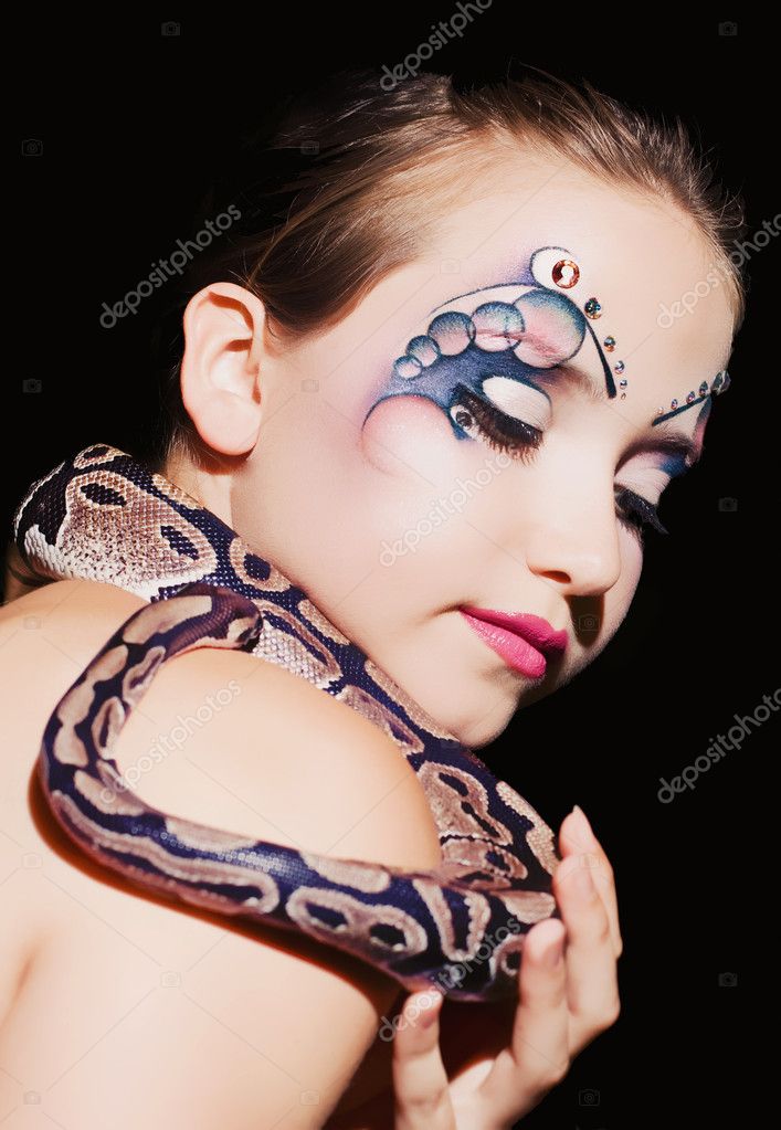 Beautiful girl with a snake — Stock Photo © april_89 #3620946