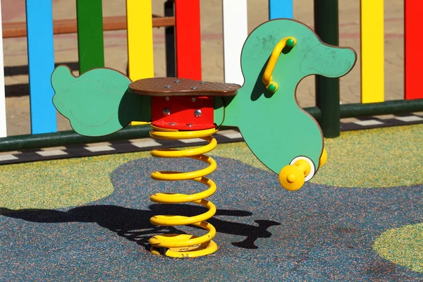 Playground rocking horses | Playground rocking horse — Stock Photo ...