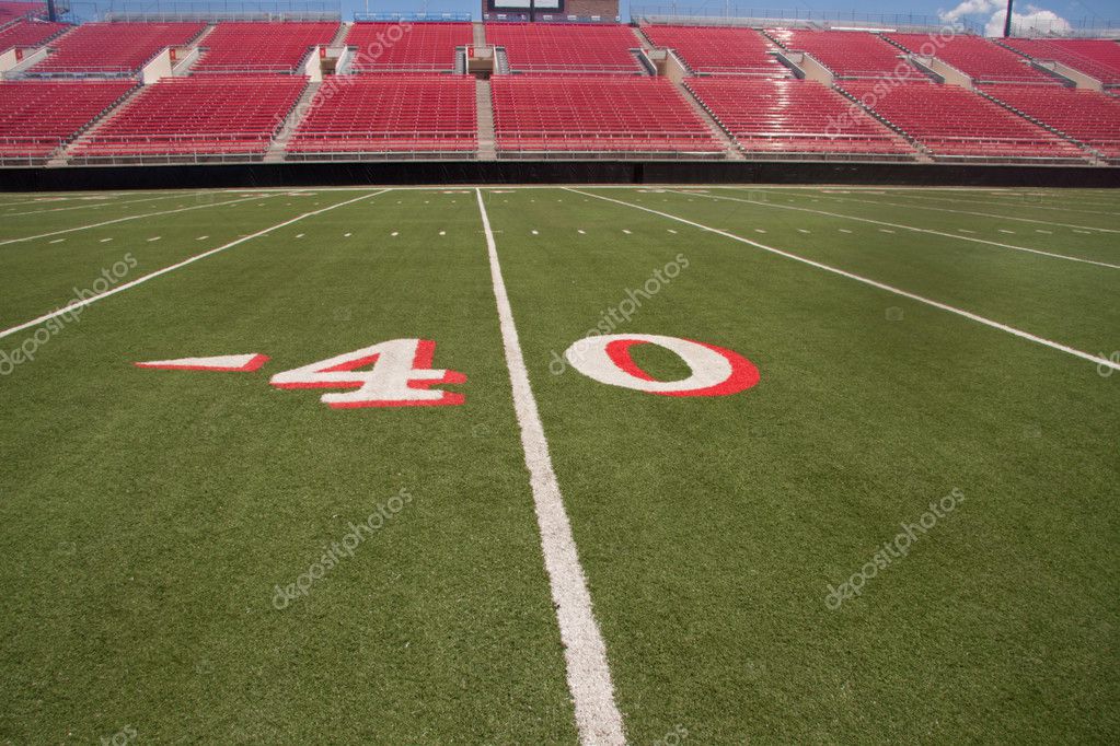 Football stadium 40 yard line Stock Photo by ©GunterNezhoda 3646410